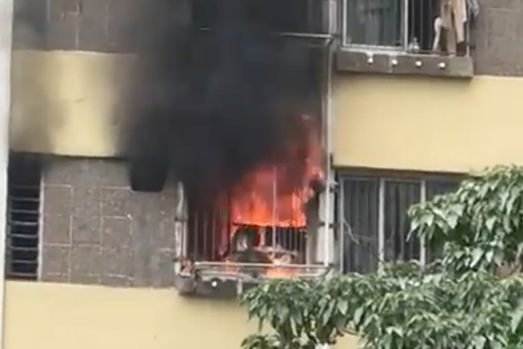 Fire at Hong Kong public housing estate forces dozens to evacuate ...