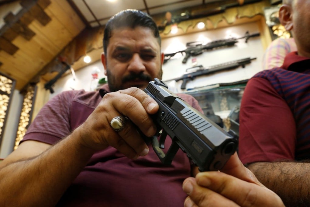 Business is booming at Baghdad gun shops after arms control rethink ...