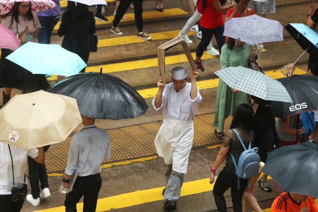 Hong Kong Observatory cancels amber rainstorm signal, but wet weekend ...