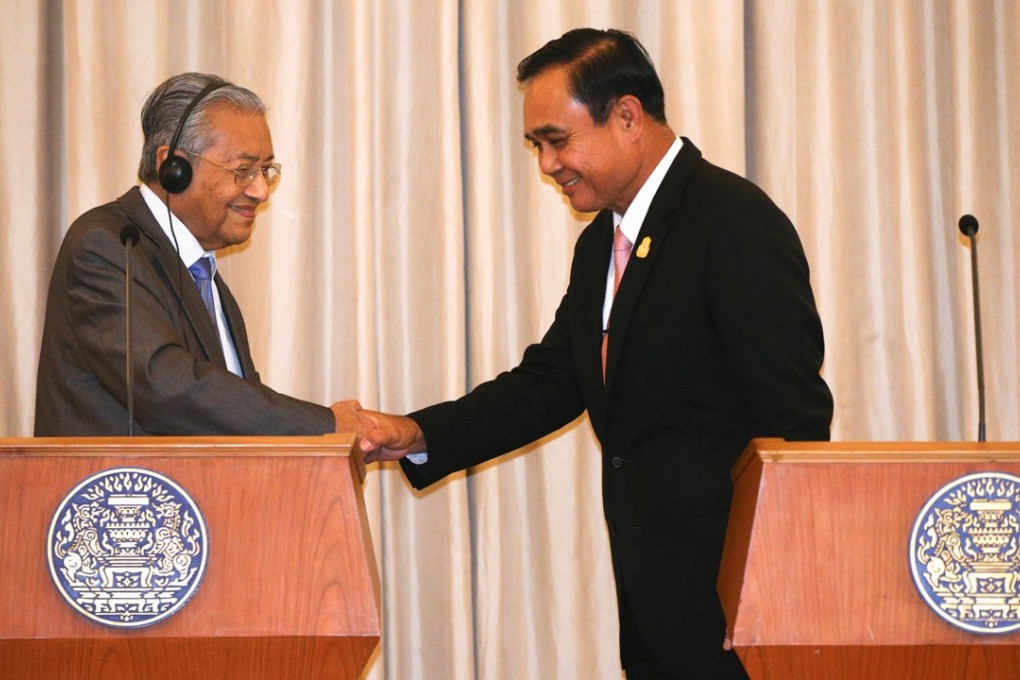 Malaysian PM Mahathir Mohamad and Thai PM Prayuth Chan-ocha discuss ...