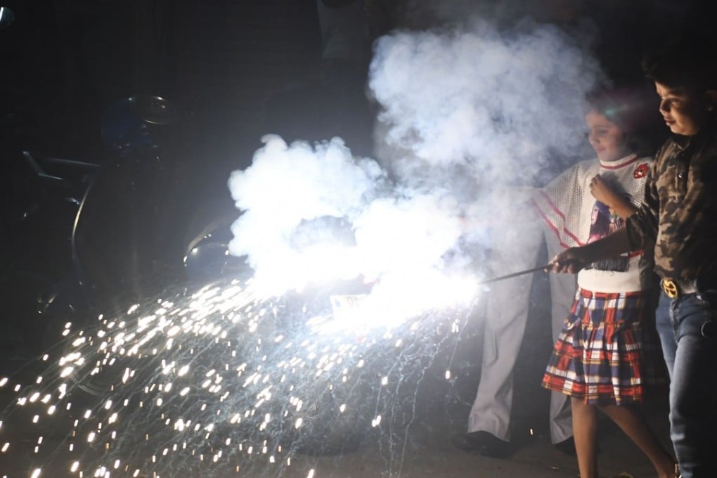 Diwali firecrackers send air pollution levels in New Delhi soaring as ...