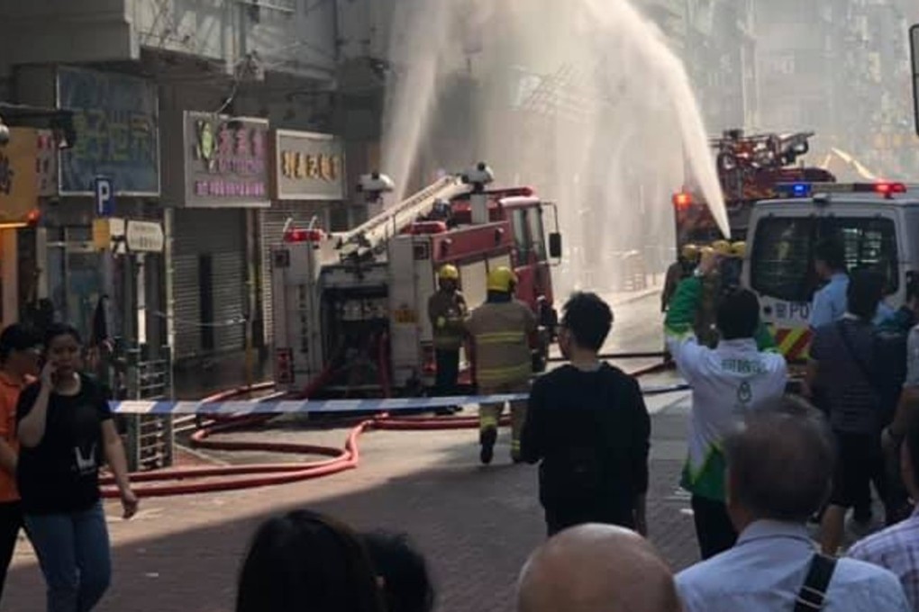 Three people in hospital after fire in Hong Kong tenement block | South ...