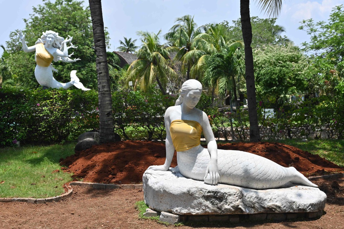 Indonesian park covers up bare-breasted mermaid statues with tube tops ...