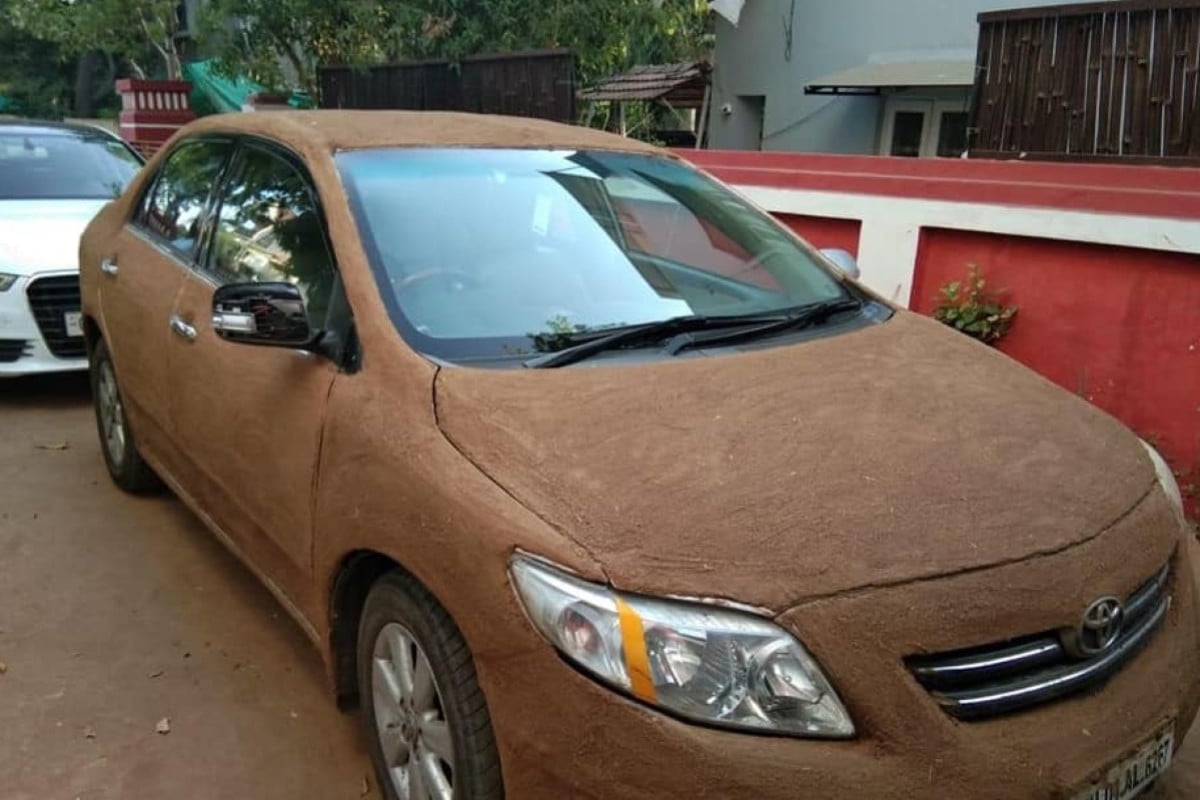 Indian car owner protects vehicle with layer of cow dung as summer ...