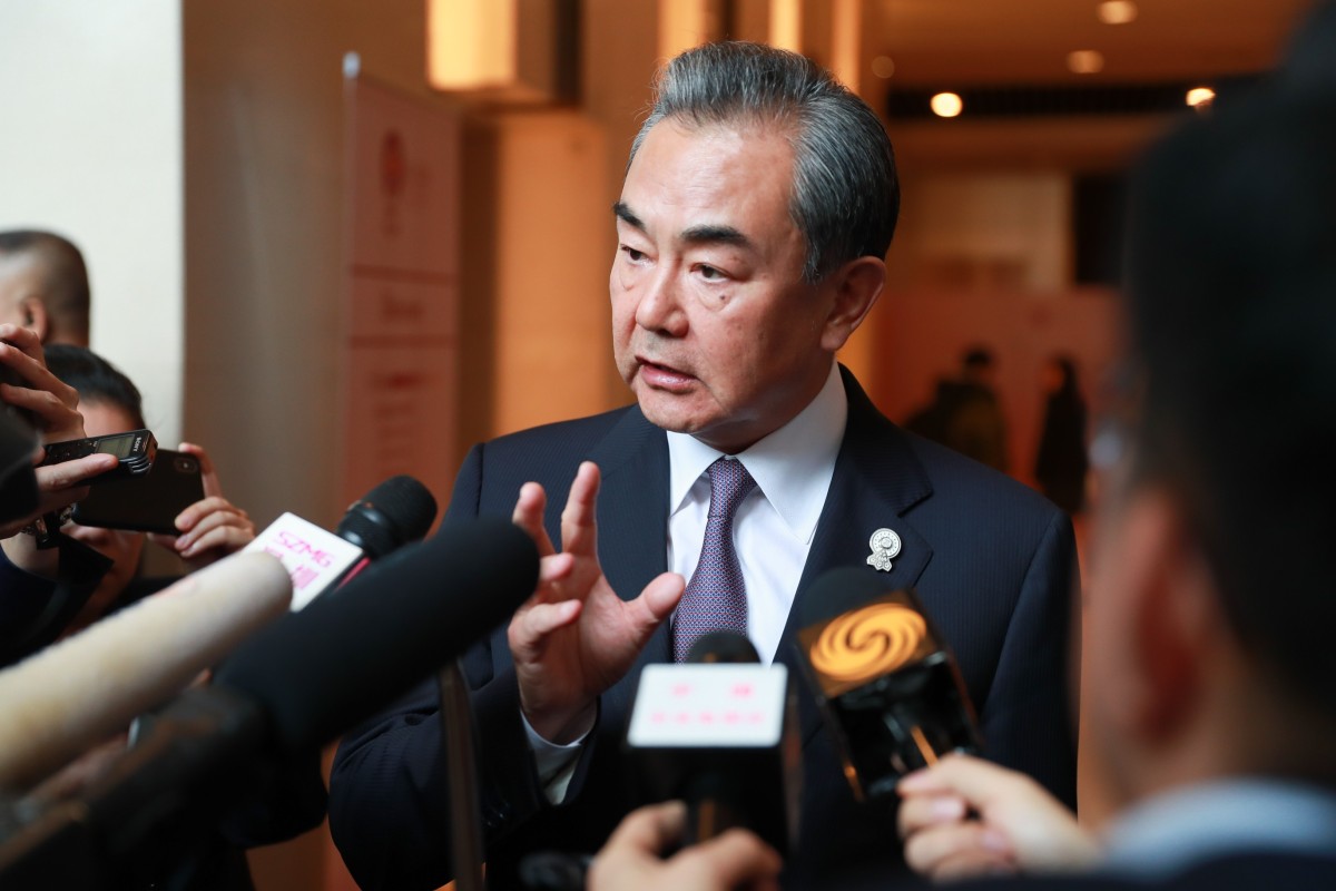 Chinese Foreign Minister Wang Yi calls on Hong Kong business leaders to ...