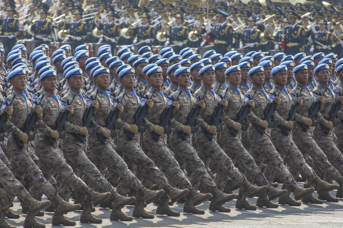 Chinese men held under cybersecurity laws for chat group threats and ...