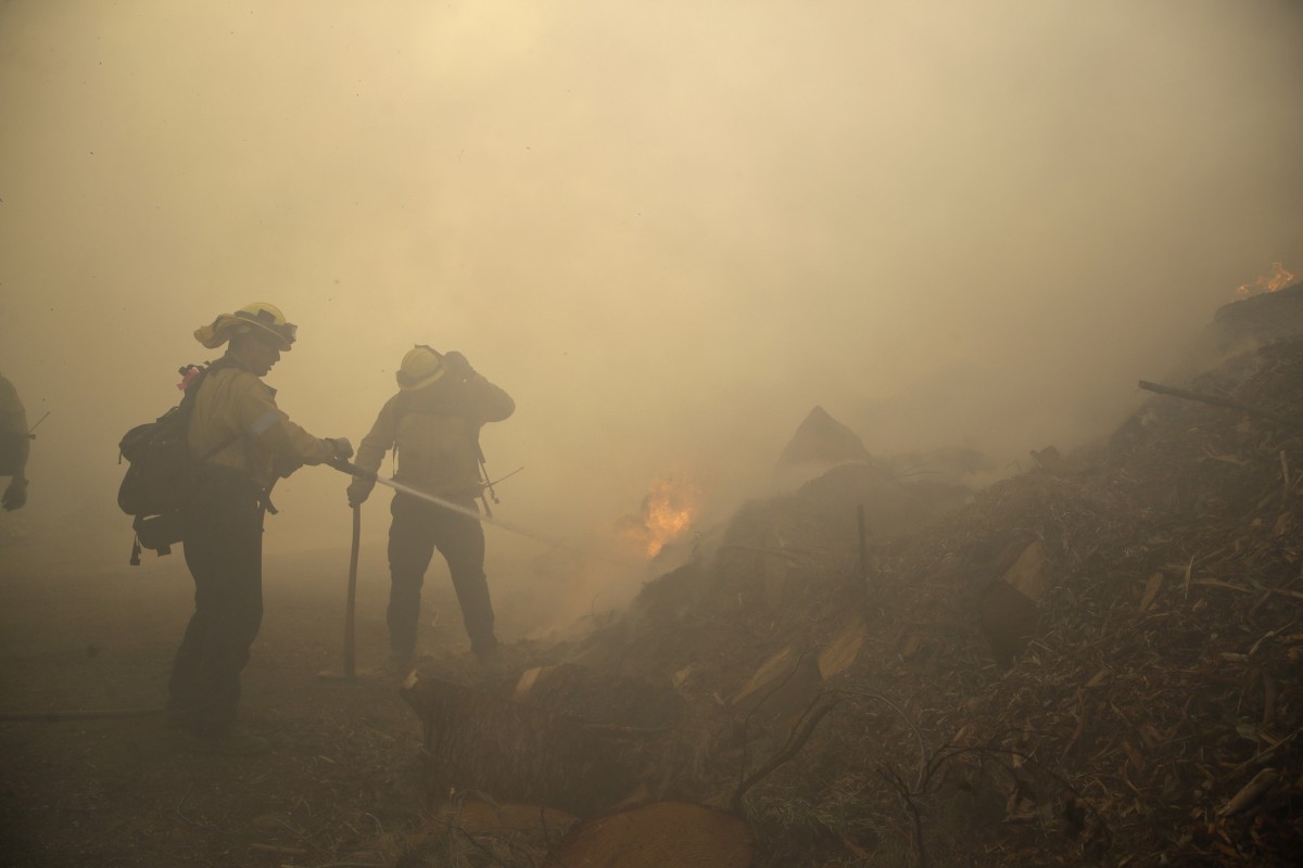 100,000 evacuated as firefighters battle to contain southern California ...