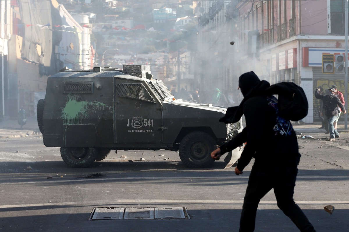 Chile extends curfew after two die in further protest violence as riots ...