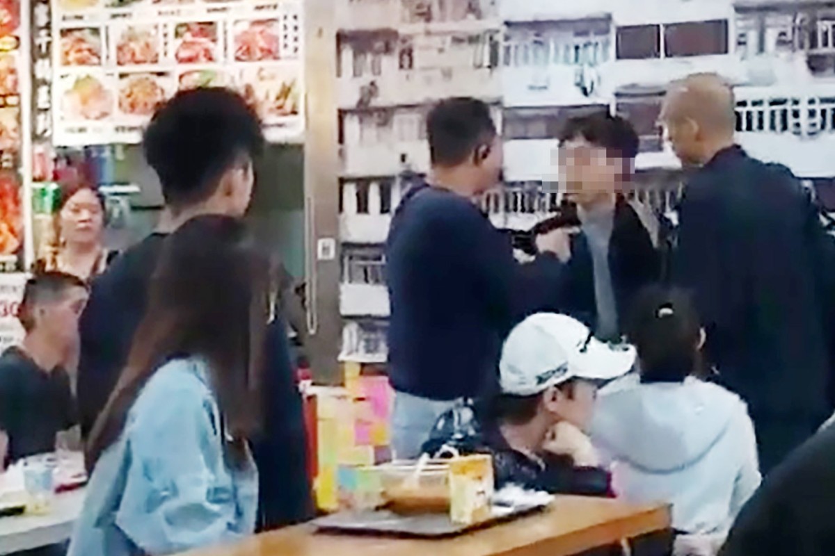 Man Arrested After Catching Hong Kong Police On Camera In Restaurant