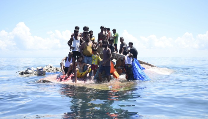 Rohingya refugees in Indonesia, Banksy painting in London, lava in ...