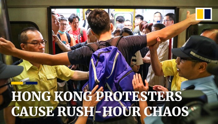 Protesters block subway trains causing massive delays during Hong Kong ...