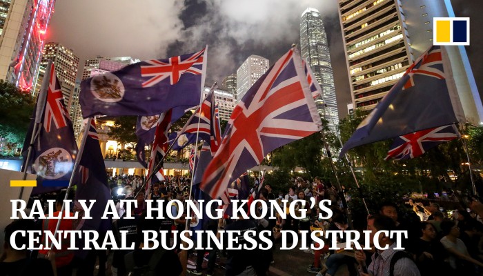 Night rally draws tens of thousands to Hong Kong’s central business ...