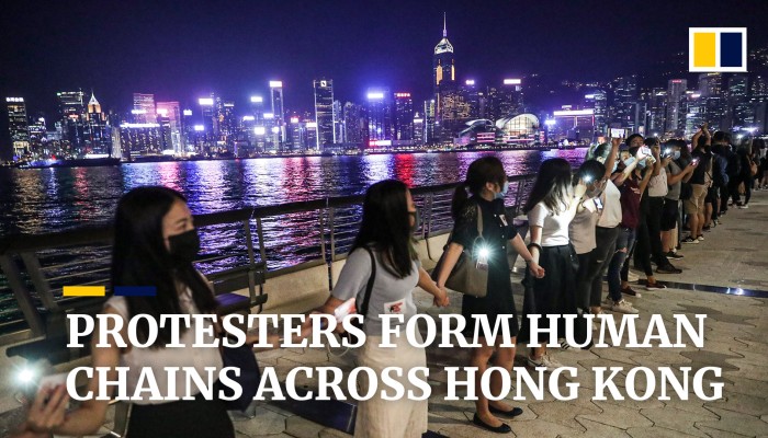 Hongkongers form human chains across the city to voice demands to ...