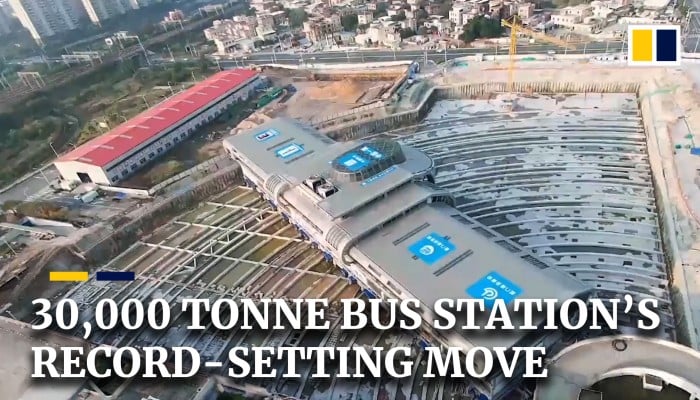 Chinese 30,000-tonne bus terminal lifted and moved in world record feat ...