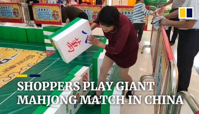 Shoppers play with giant mahjong tiles at mall in China | South China ...