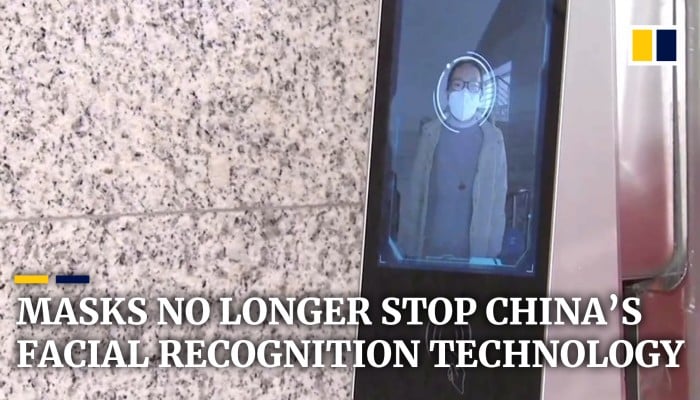 China’s facial recognition technology identifies people wearing masks amid the Covid-19 epidemic ...