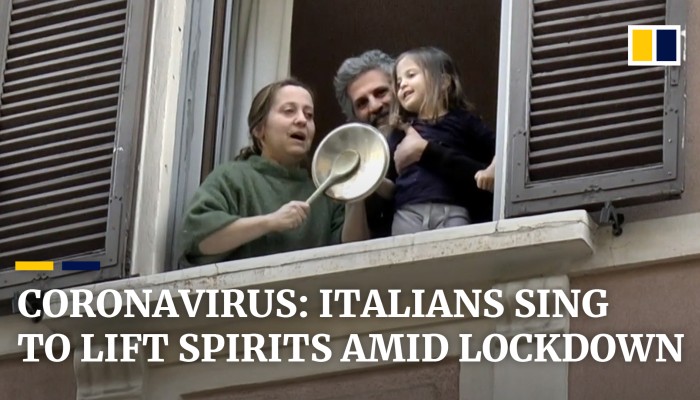 Italians in nationwide coronavirus lockdown sing together to boost ...