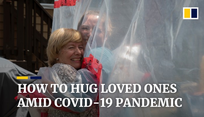 Canadian invents ‘hug glove’ to embrace loved ones amid Covid-19 ...