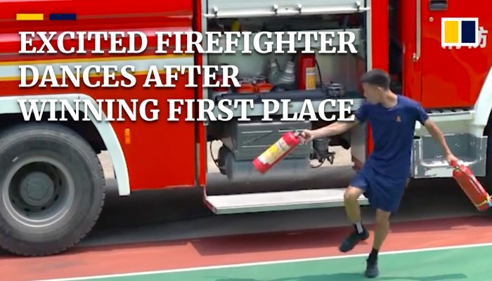 Excited firefighter dances after winning first place in training in ...