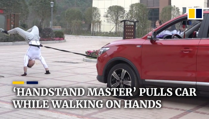 Chinese ‘handstand master’ pulls car while walking on hands | South ...