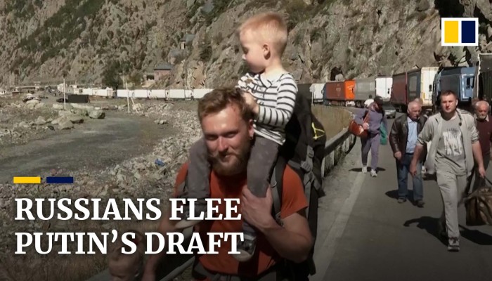 Flocks of Russians flee to avoid draft orders, while those who stay ...