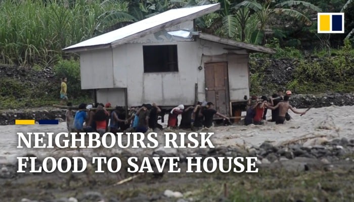 Men pick up and move neighbour’s house to avoid flash flooding in ...