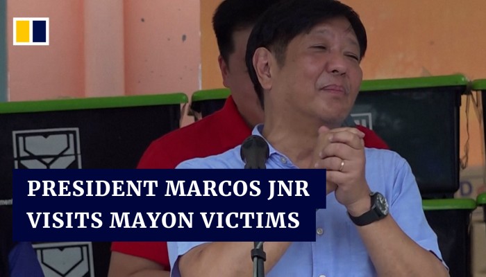 Mt Mayon eruption evacuees are paid a visit by Philippine President ...