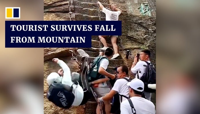 Chinese tourist survives fall from steep mountain steps | South China ...