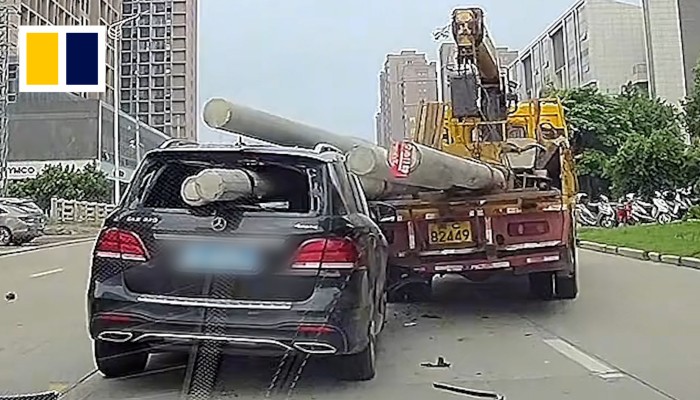 Driver narrowly escapes injury after SUV impaled by poles in China | South China Morning Post