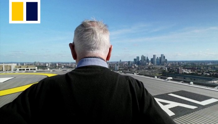 102-year-old World War II pilot abseils down a London building for ...