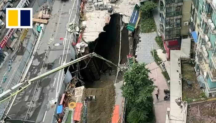 Road collapses after water pipes burst near construction site in China ...