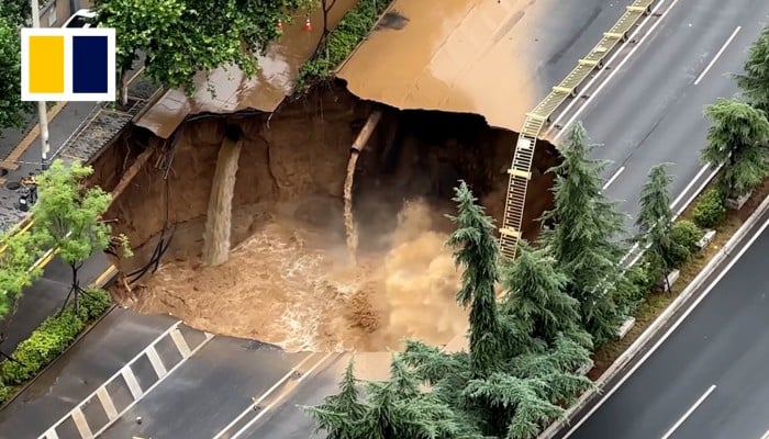 Road collapses, forming massive sinkhole at construction site in China ...