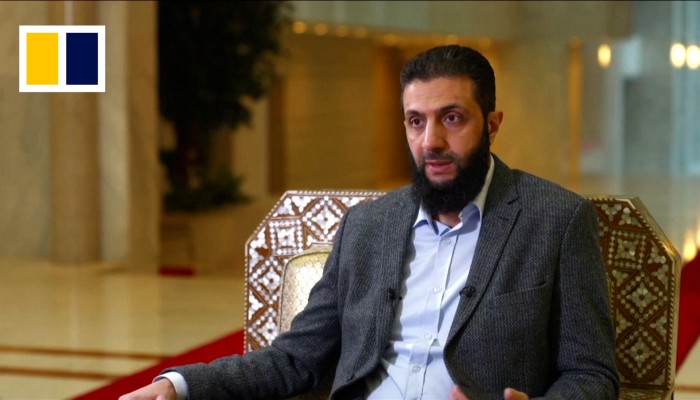 De facto leader of Syria’s new administration takes conciliatory tone ...