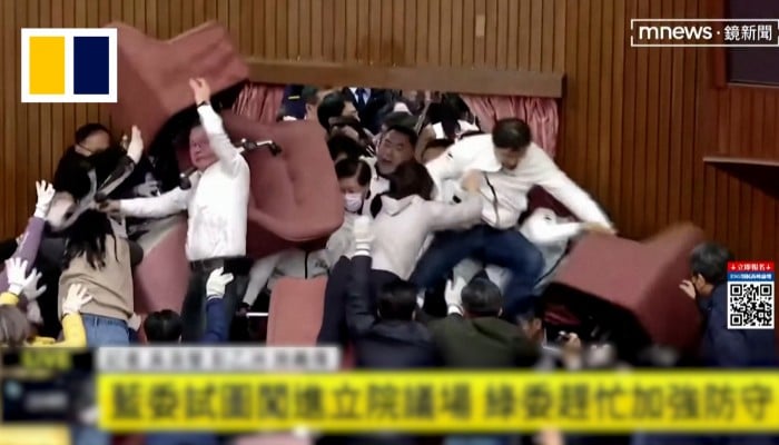 Taiwanese lawmakers brawl in parliament over controversial bills ...