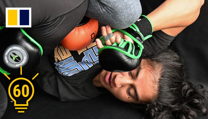 The ‘arm collector’: pioneering Pakistan woman MMA fighter breaks ...