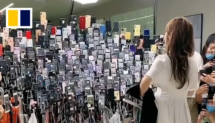Chinese woman holds live streams on 100 phones to promote shop | South ...