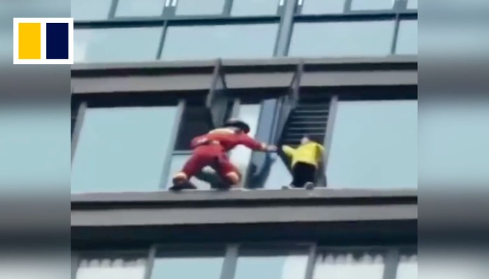 Chinese girl rescued after being stranded on window ledge | South China ...