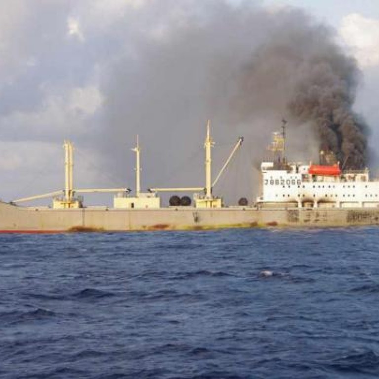 Japan's coastguard saves Chinese crew as cargo ship Ming Yang burns ...