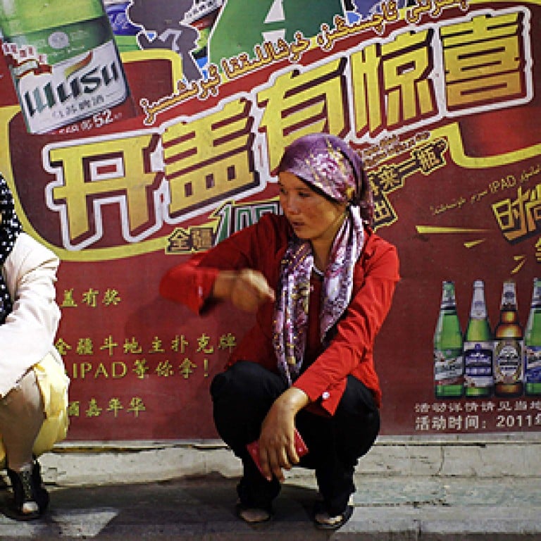 Xinjiang minorities too busy dancing to make trouble, says Chinese ...