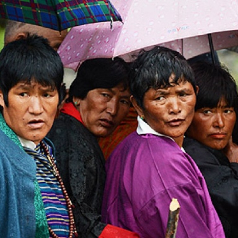 Bhutanese brave mountains and monsoon for election | South China ...
