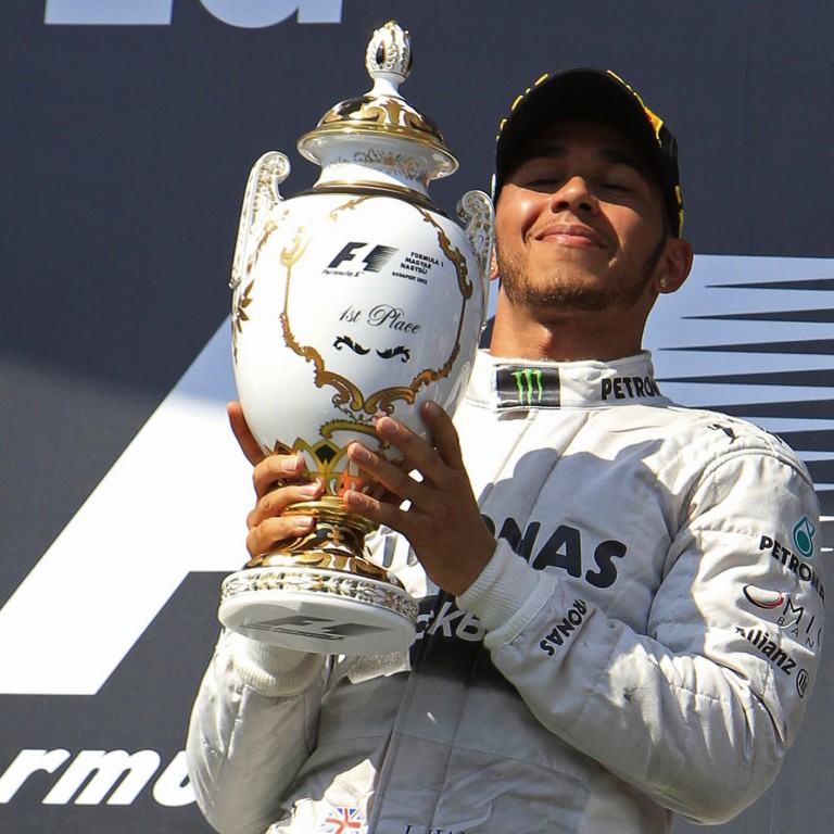 Briton Lewis Hamilton lands fourth Hungarian GP trophy for Mercedes ...