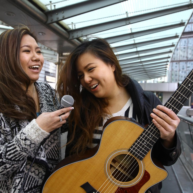 Young Hong Kong buskers share a name, but follow different musical ...