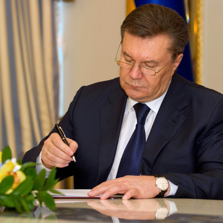 Opposition leaders sign peace deal with Ukraine's President Viktor ...