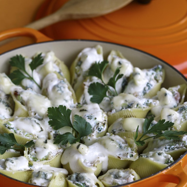 Baked pasta shells stuffed with broccoli and pancetta, and baked home ...