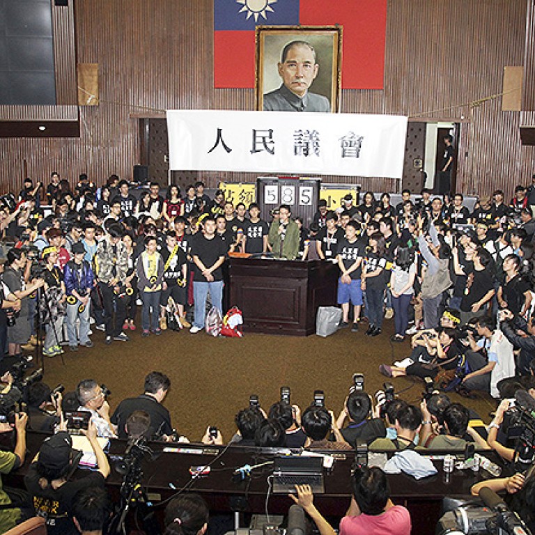 Taiwan activists peacefully exit parliament after weeks-long occupation ...