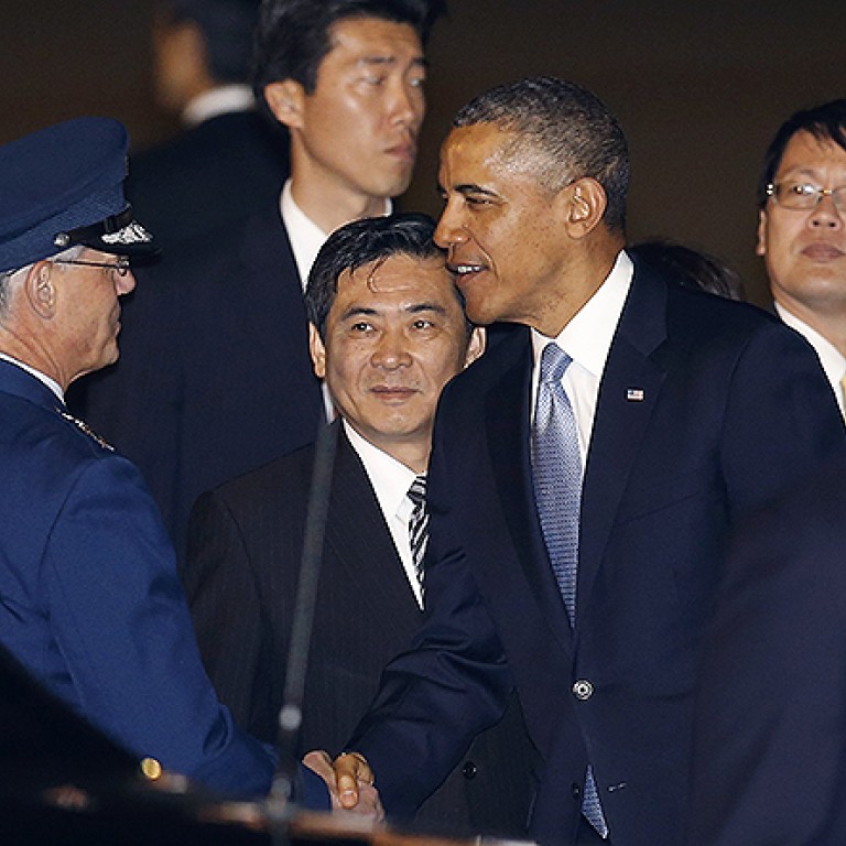 Obama touches down in Japan for first leg of tension-filled Asian tour ...