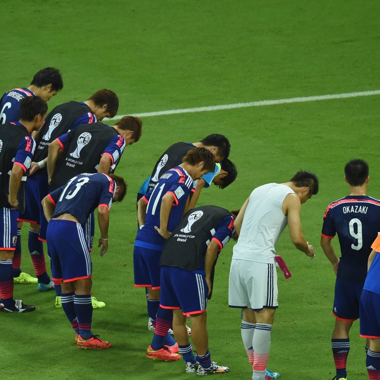 Japan football fans win praise for cleaning stadium after their team's ...