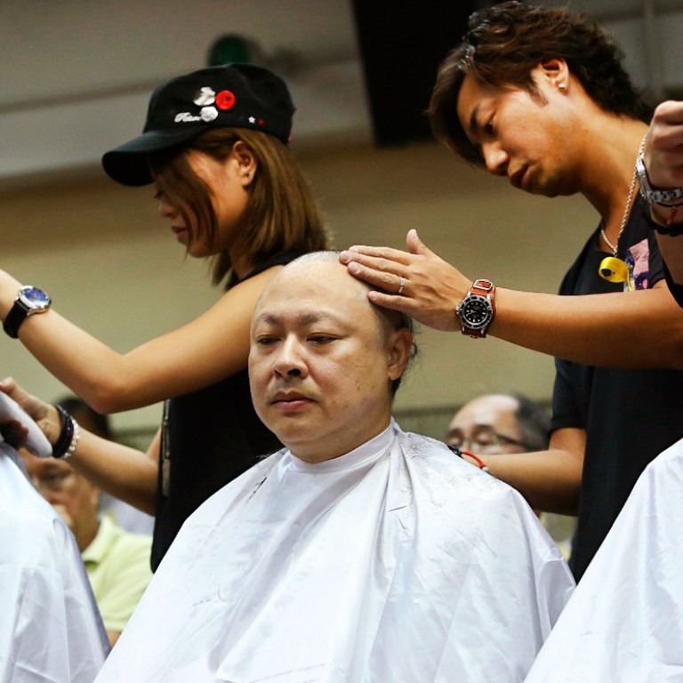 Occupy Central leaders shave heads to show ‘determination for democracy ...
