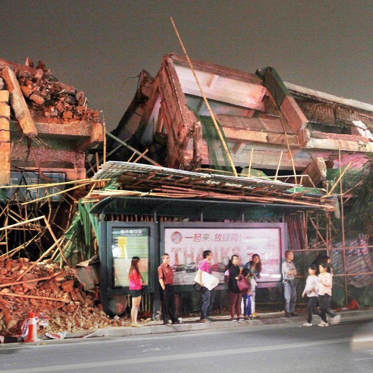 Chinese commuters undeterred after building collapses onto bus stop ...