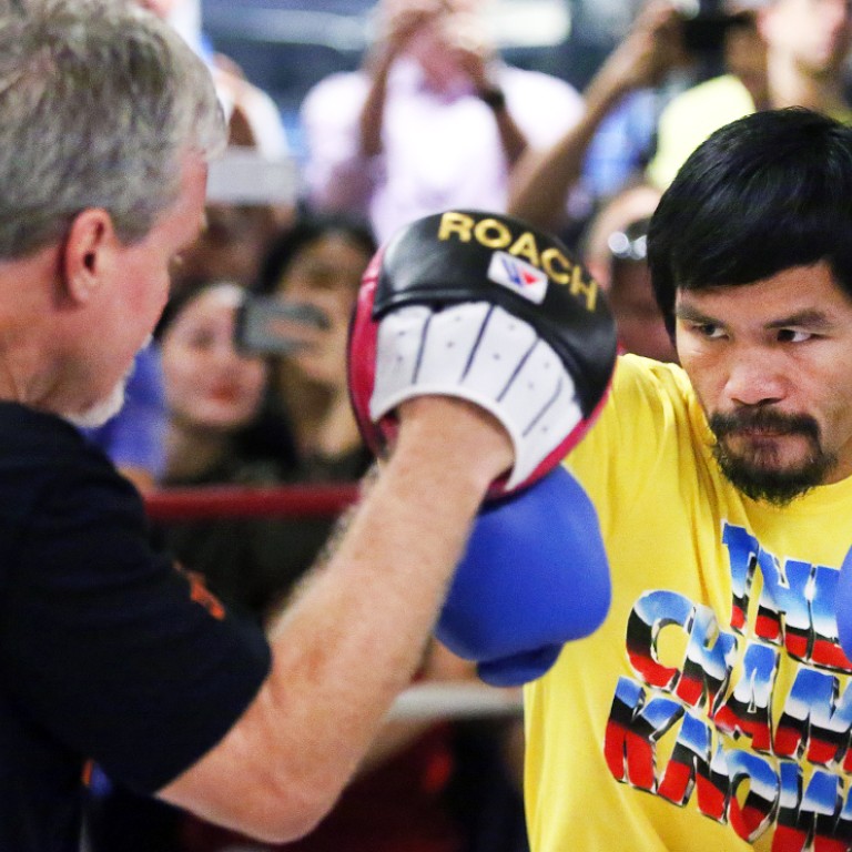 Mayweather bout 'buzz in background' as Pacquiao arrives in Macau ...